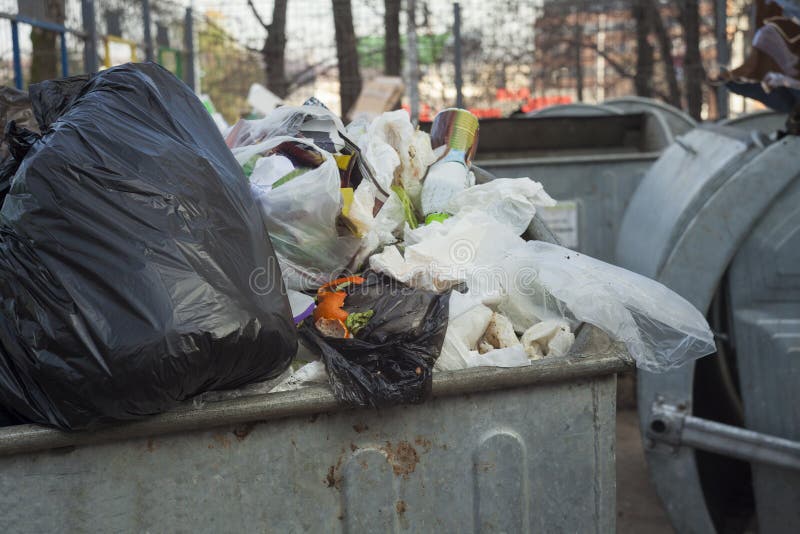 Recycle Bin Full of Garbage Stock Photo - Image of bottle, paper: 99709128