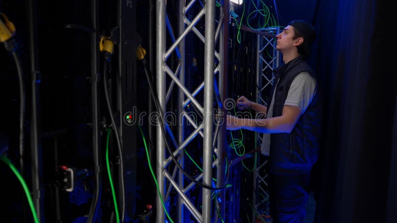 Full Shot Worker Checking Big Led Screen Panels Wires. Technician ...