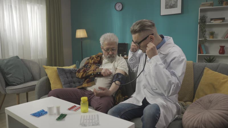 Full-size Video of a Doctor Checking Up the Condition of His Patient at ...