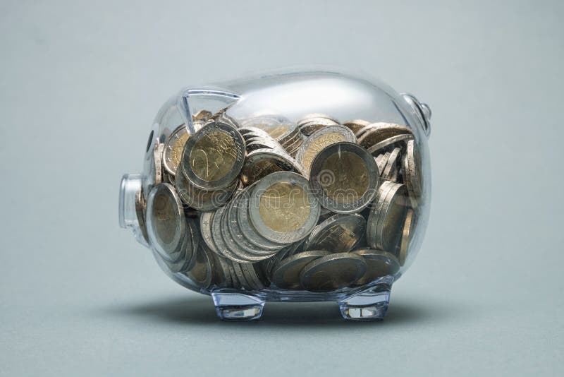 Genomskinlig Spargris Med Pengarmynt Fotografering för Bildbyråer ...