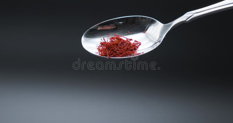 Saffron Falling in Slow Motion from Spoon Stock Video - Video of full ...