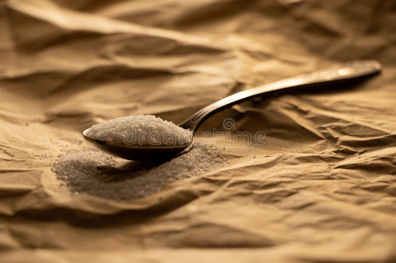 Full Spoon of Table Salt on Brown Paper Close-up Stock Image - Image of ...