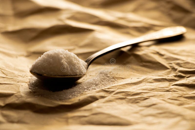 Full Spoon of Table Salt on Brown Paper Close-up Stock Photo - Image of ...