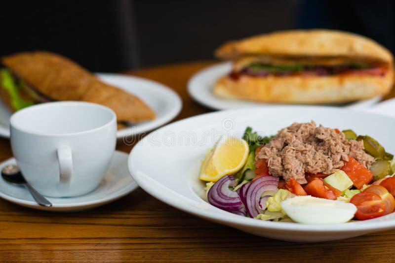 Full Table of Delicious and Different Dishes in Cafe with Cup of Coffee ...