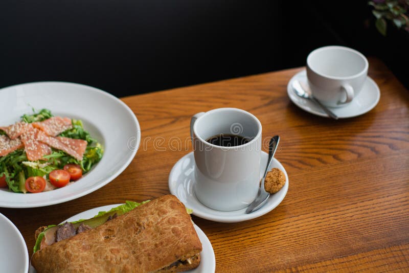 Full Table of Delicious and Different Dishes in Cafe with Cup of Coffee ...