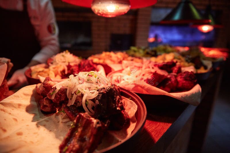 Full Table with Various Dishes in a Restaurant or Cafe Stock Photo ...