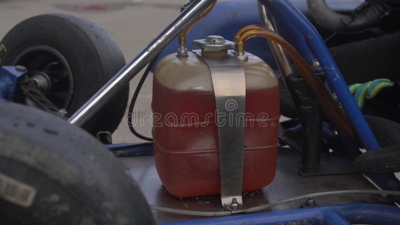 Fuel tank in a racing car stock video. Video of karting - 298321859