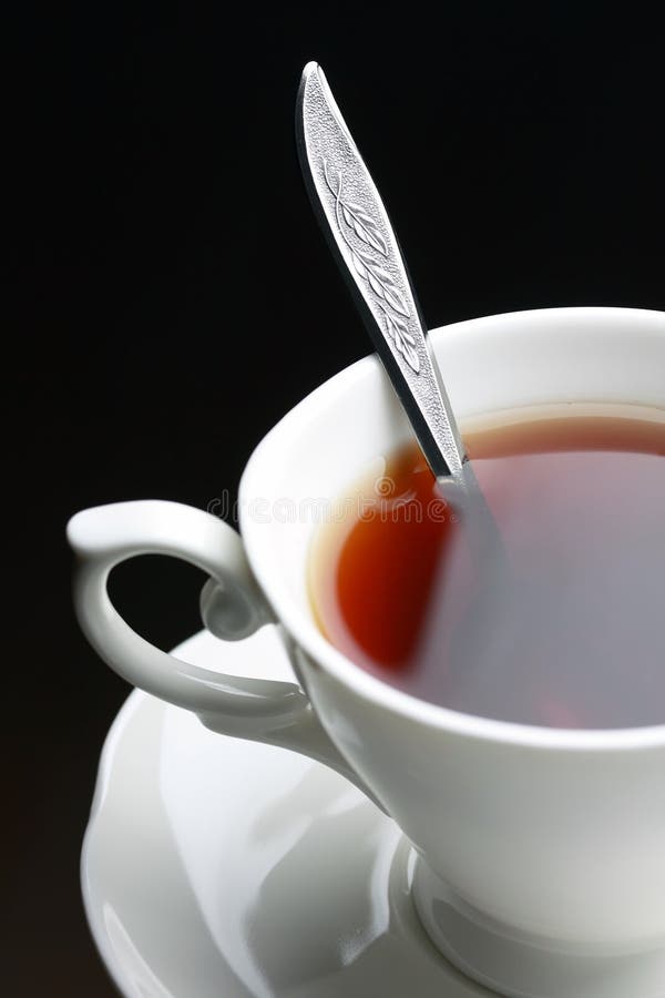 Full tea cup with spoon stock image. Image of focus, coffebreak - 22684037