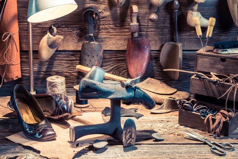Old tools of the shoemaker stock image. Image of bench - 27087971