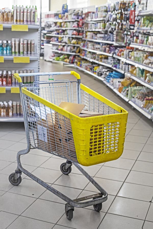 Full Yellow Grocery Cart with Craft Boxes in the Mall, Stock Image ...