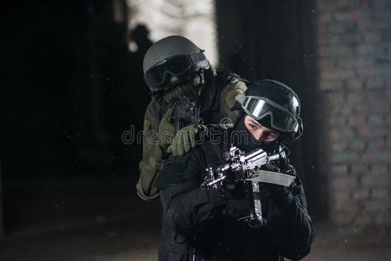 Fully Equipped Military Men with Automatic Weapons Stock Photo - Image ...