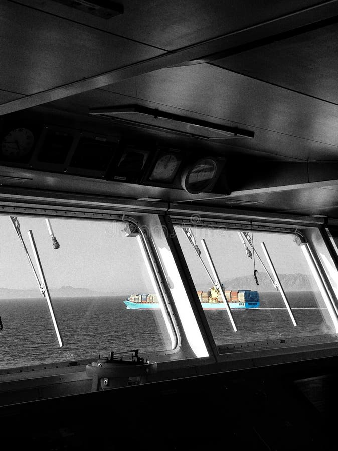 A Fully Loaded Container Vessel Over Taking the Bulk Carrier Ship Stock ...