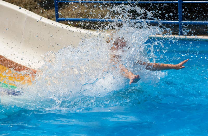 Young People Having Fun on Water Slides in Aqua Park Stock Photo ...