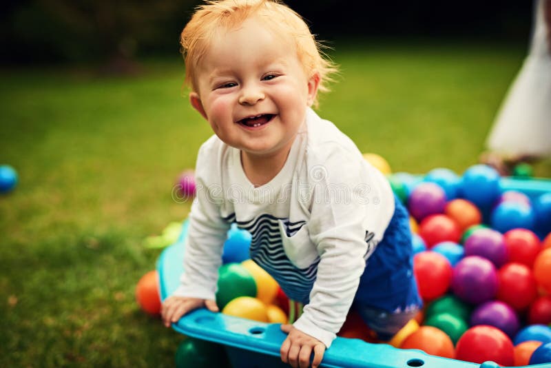 Fun in the Backyard. Shot of an Adorable Little Boy Playing in the ...