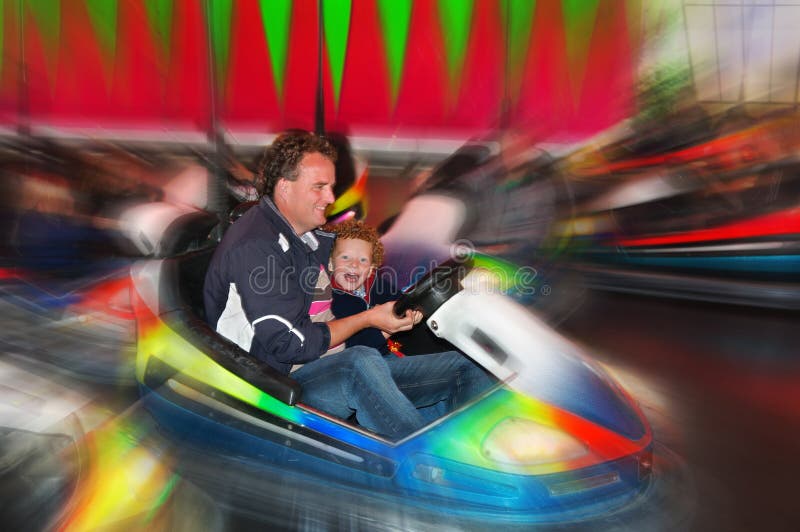 Fun in bumper cars on fair stock photo. Image of laughing - 21174588