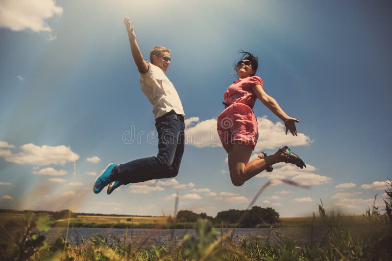 Couple jump stock image. Image of cleen, enjoy, casual - 12889337