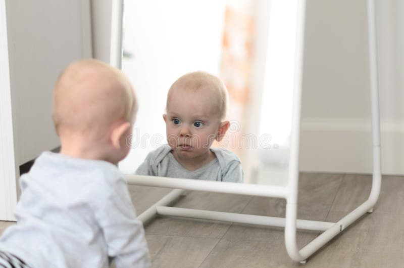 Fun Cute Baby Seeing Self in Mirror Stock Image - Image of objects ...