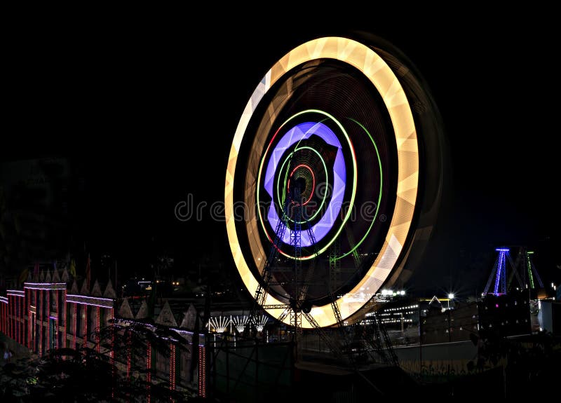 Fun Fair Giant Colorful Ferris Wheel Spinning at Night Stock Image ...