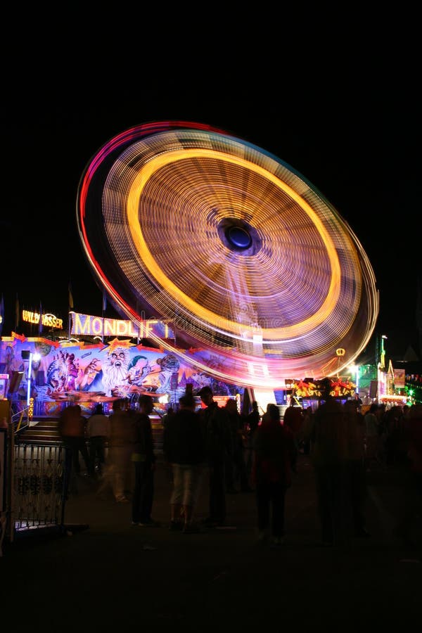 Fun fair at night editorial stock photo. Image of long - 61716338