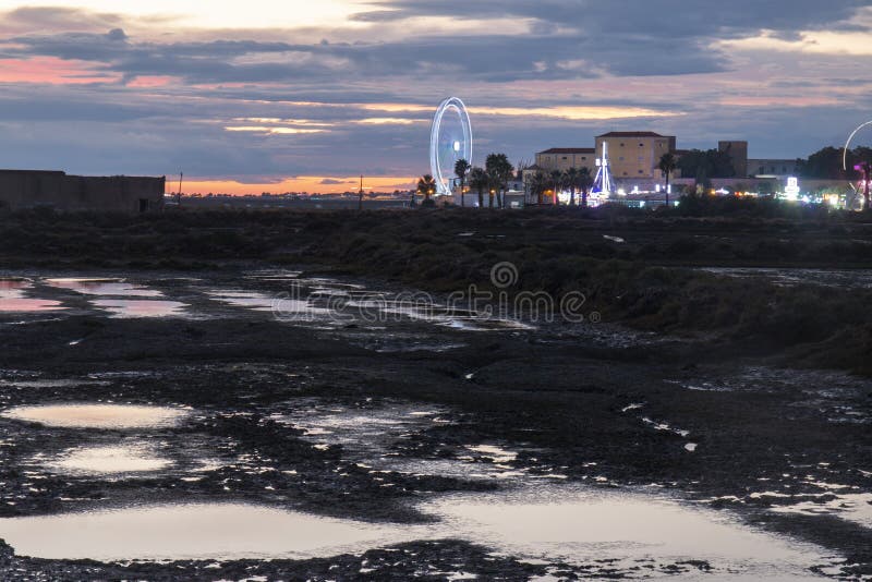 Fun fair at sunset stock photo. Image of lights, swamp - 152180880