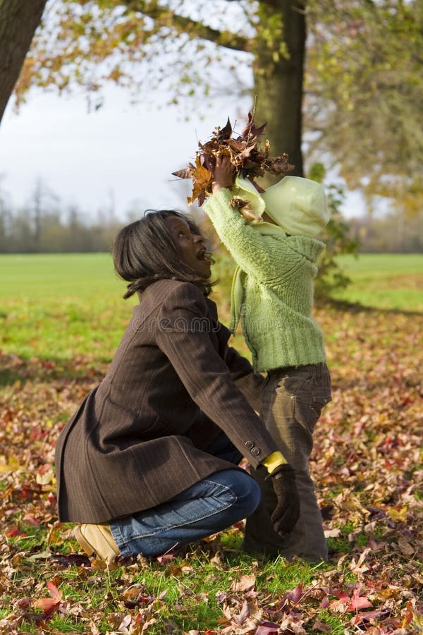 Fun in the Fall stock image. Image of maternal, laugh - 3721277