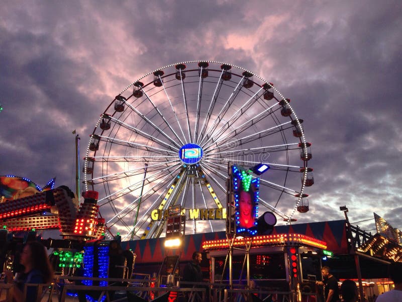 Big wheel on a fun fare stock image. Image of intentional - 74500175