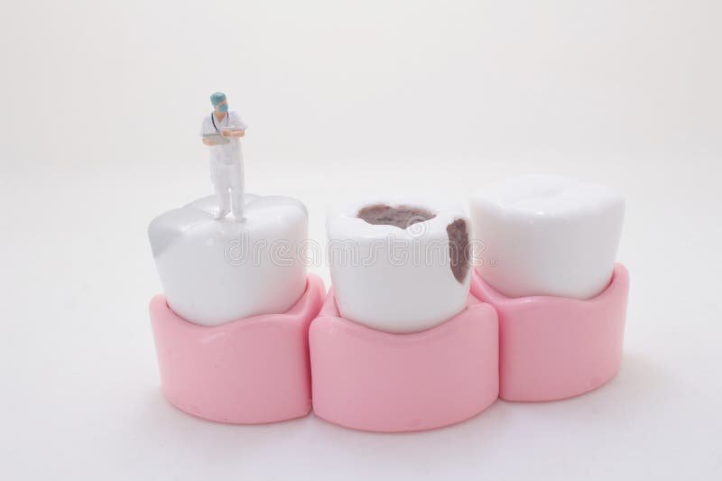 The Fun of Figure Dentist Repairing Human Teeth with Gums a Stock Image ...