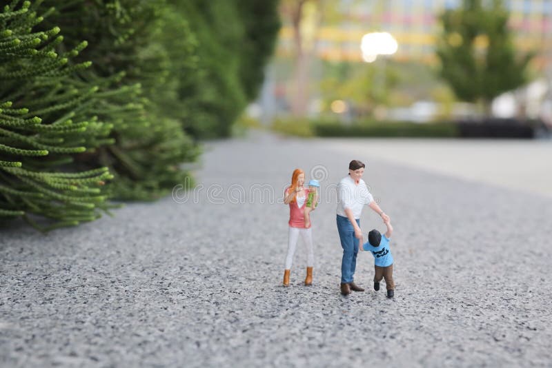 A Fun of Figure Family at the Park Stock Image - Image of public ...