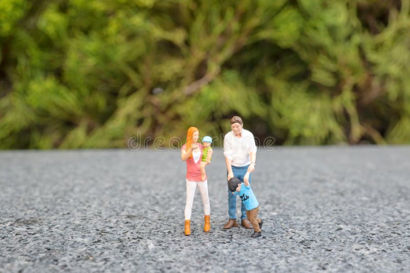A Fun of Figure Family at the Park Stock Image - Image of outdoors ...