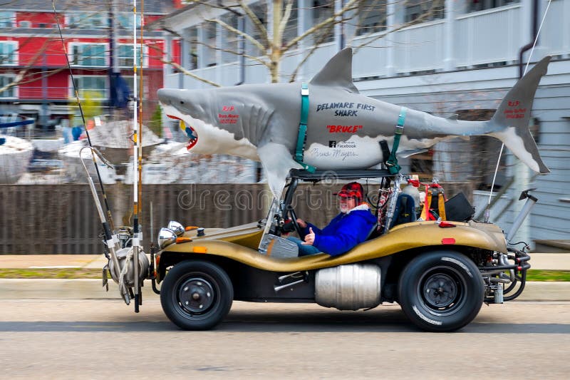 Fun Fisherman on a Buggy with a Shark Driving Down the Road Editorial ...