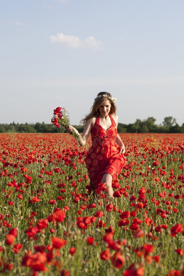 Girl Having Fun in a Poppy Field Stock Photo - Image of green, female ...