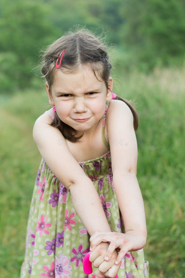 Fun grimacing little girl stock photo. Image of entertainment - 69194756