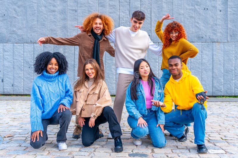 Fun Group of Friends Posing Crouching and Standing Outdoors Stock Image ...
