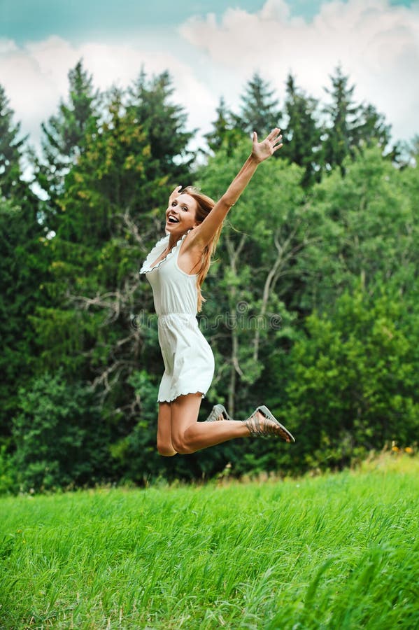 Beautiful Joyful Woman is Jumping. Stock Image - Image of cableway ...
