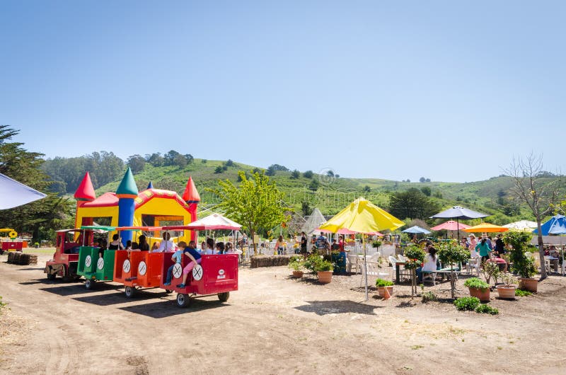 Fun house with train rain stock image. Image of theme - 68859509
