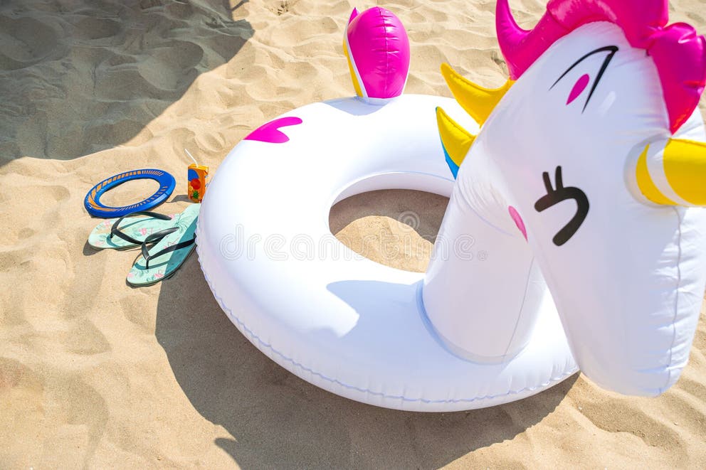 Close Up View Image of Fun Inflatable Pony Float with Flip Flops on ...