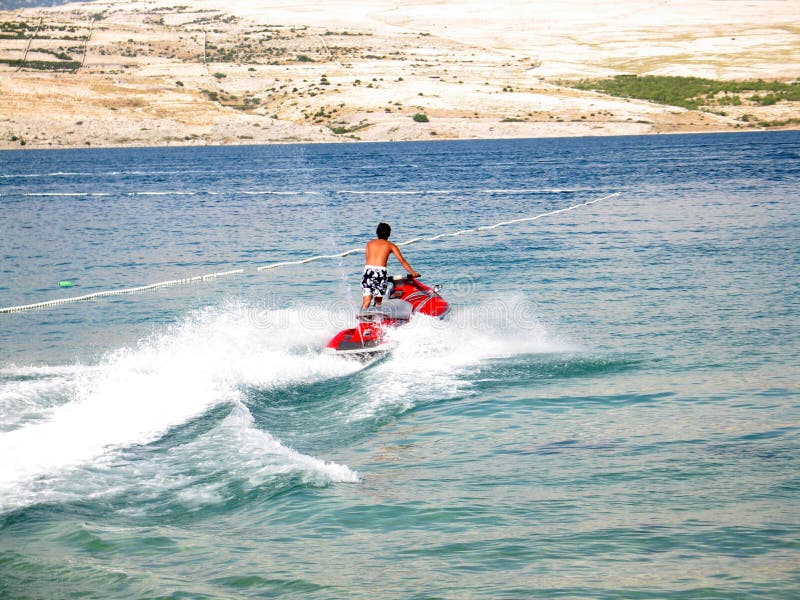 Fun on jet-ski stock photo. Image of spray, drops, activity - 5824344