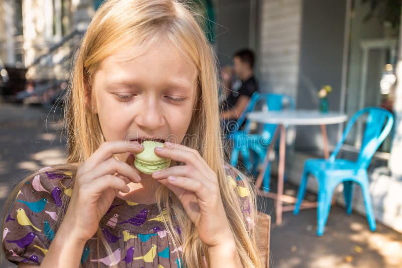 The Boy Eating Macaron at the Park. Stock Image - Image of tasty ...