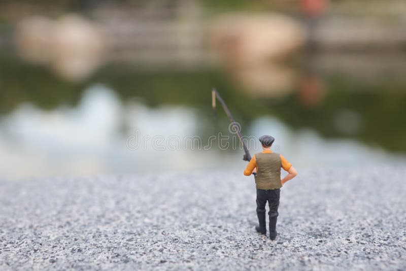 A Fun of Mini Figure is Fishing Stock Photo - Image of fish, parent ...