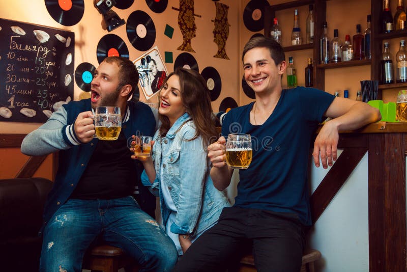 Fun People at Bar Looking Away Drinking and Laughs Stock Image - Image ...