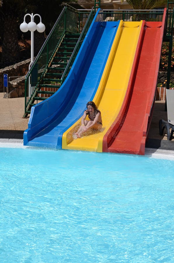 Fun on pool slide stock photo. Image of resort, alone - 24193690