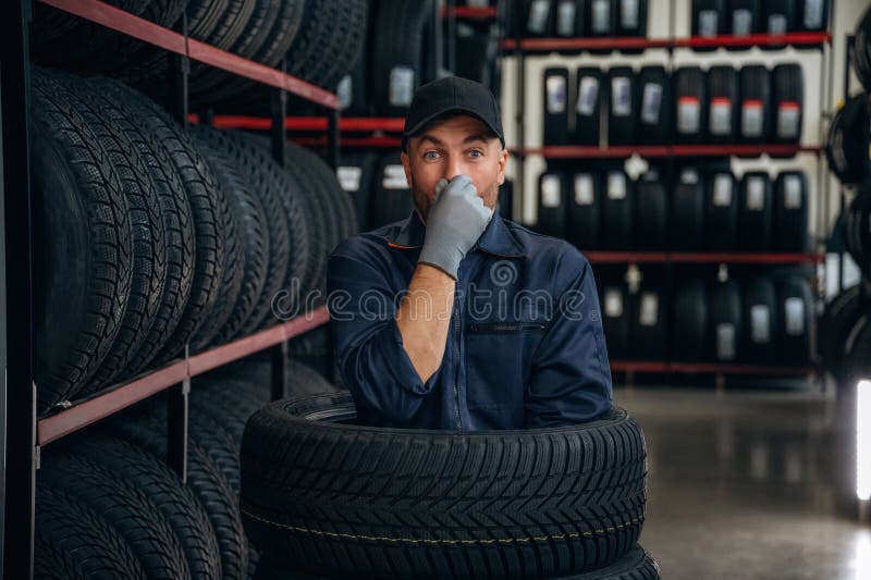Fun, Pretending To Dive Inside the Wheels. Man Worker is Maintenance ...