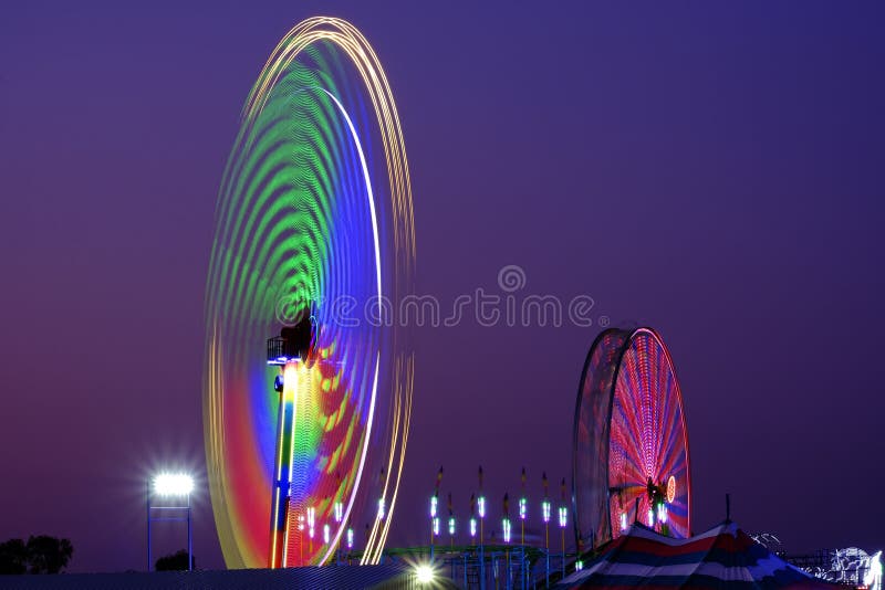 Rides at Fair or Carnival at Night Stock Photo - Image of background ...