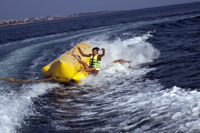 Fun riding banana boat. stock photo. Image of girl, fitness - 21284178