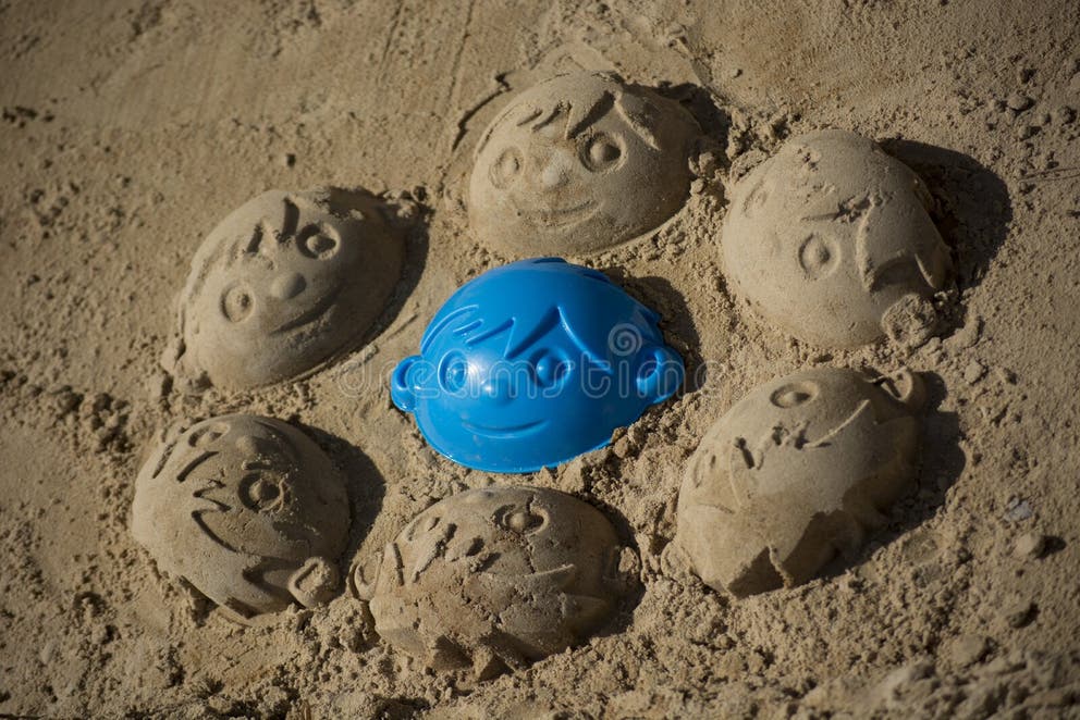 Fun sand faces of boys stock photo. Image of faces, hair - 40830066
