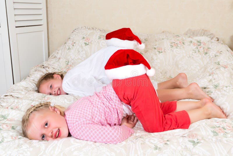 Fun with santa hats stock image. Image of claus, beautiful - 27483727