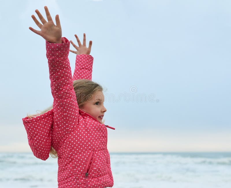 The Fun Starts at the Beach. a Little Girl at the Beach. Stock Photo ...