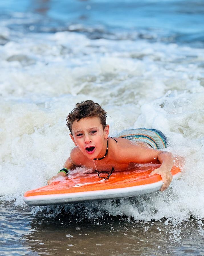 Boy Surfing the Waves stock image. Image of activity - 376588133