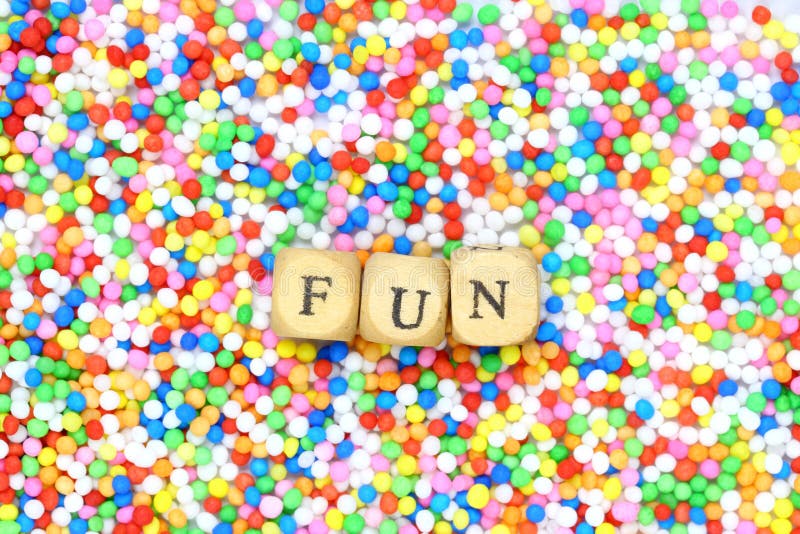 Fun text on coloured balls stock image. Image of children - 255363555