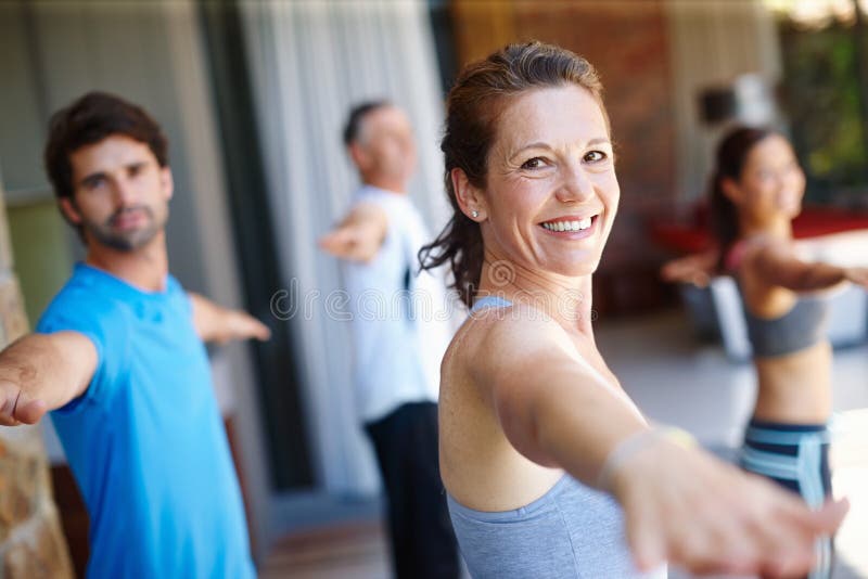 Fun Times at Gym. Portrait of a Yoga Class in Progress. Stock Image ...